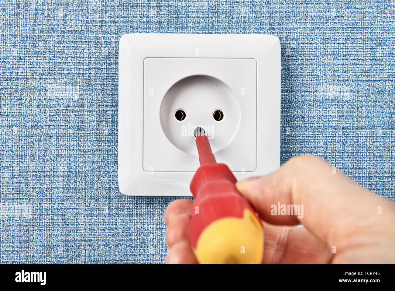 Installing of Euro standard electric socket type C, electrical power ...