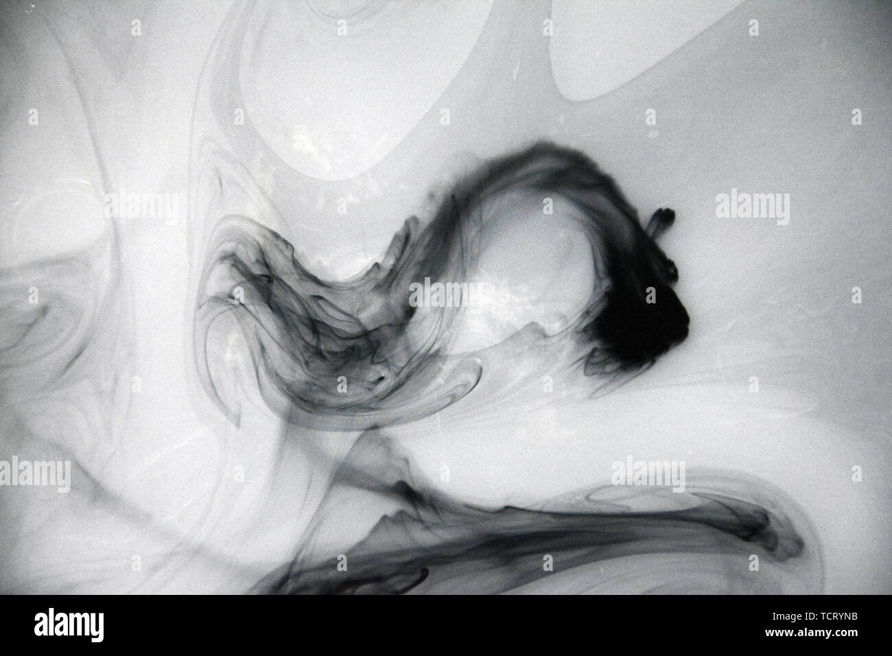 Ink background, ink flowing in water Stock Photo - Alamy