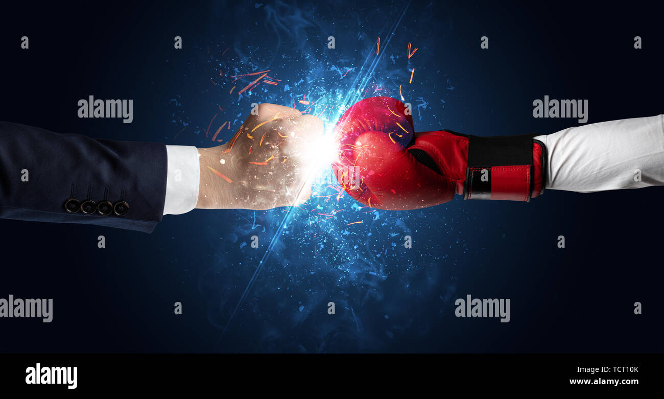 Two hands fighting with light, glow, spark and smoke concept Stock ...