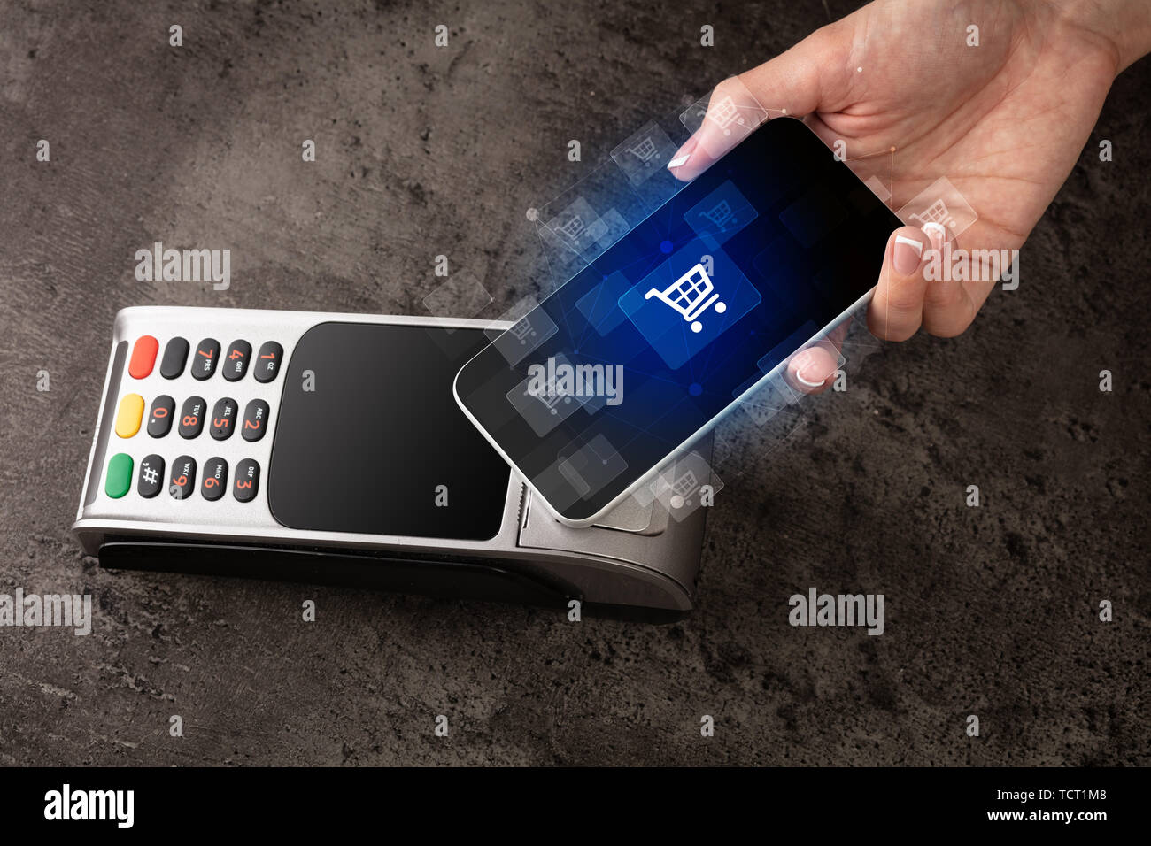 Easy paying with mobile phone in the market Stock Photo - Alamy