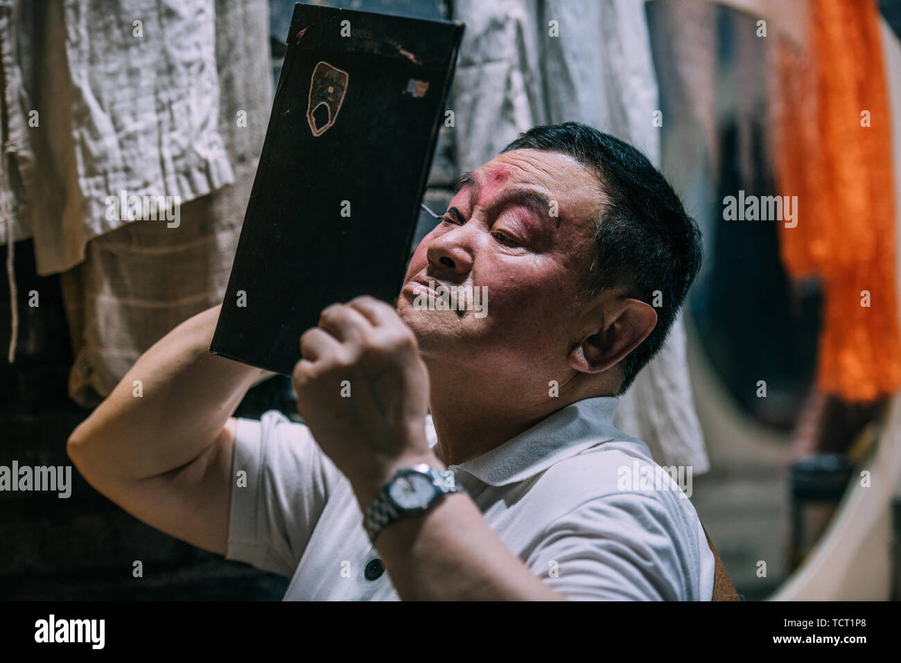 A theatrical performer in makeup backstage Stock Photo - Alamy