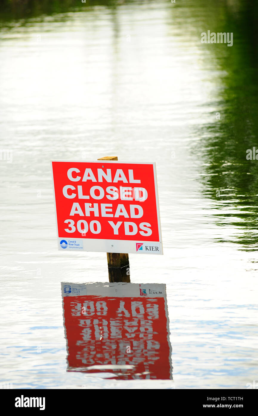 Canal closed sign in the middle of the Leeds Liverpool canal at Burnley ...
