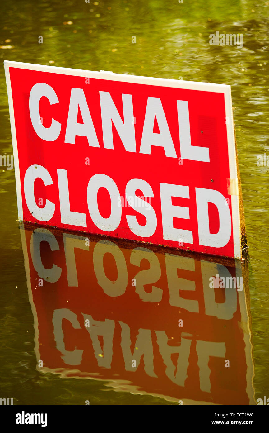 Canal closed sign in the middle of the Leeds Liverpool canal at Burnley ...