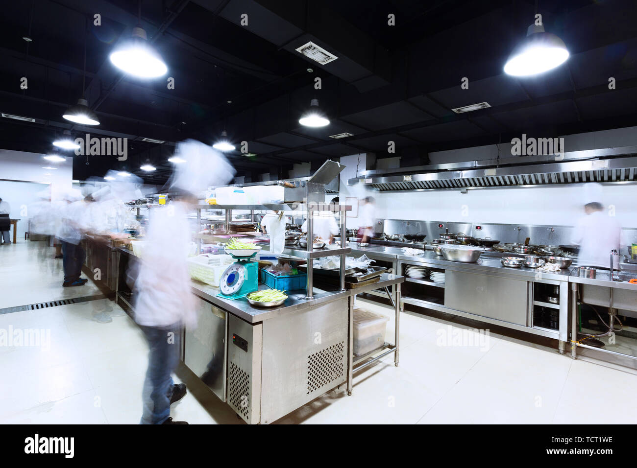 Modern and busy chefs Stock Photo - Alamy