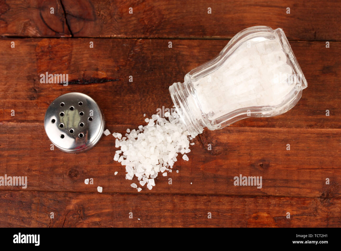 Salt sprinkled on table Stock Photo - Alamy