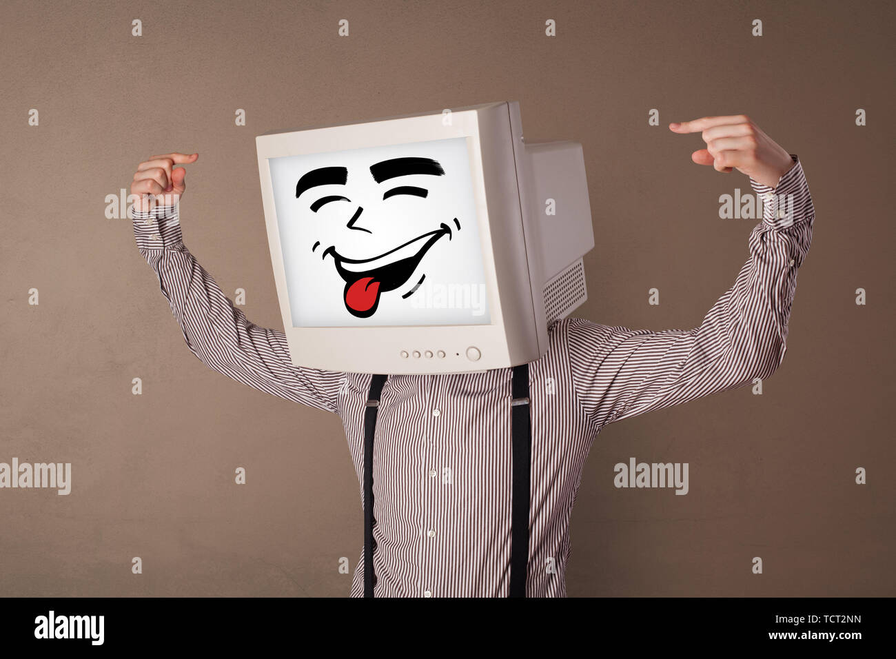Young person with happy smiley monitor head Stock Photo - Alamy