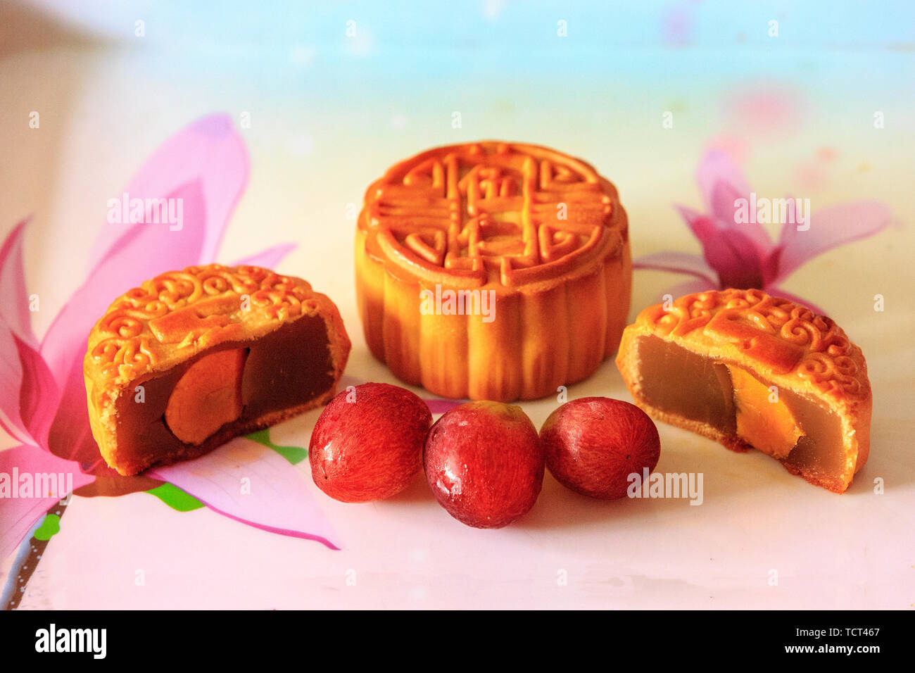 Moon cakes, tea, fruit Stock Photo - Alamy