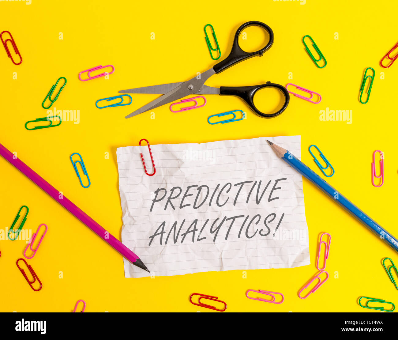 Writing note showing Predictive Analytics. Business concept for ...