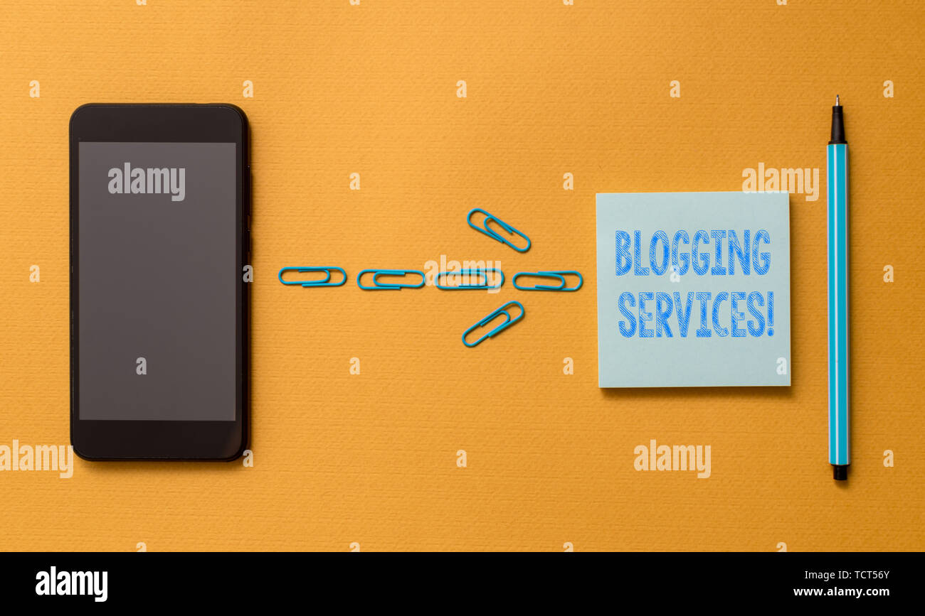 Writing note showing Blogging Services. Business concept for Social ...