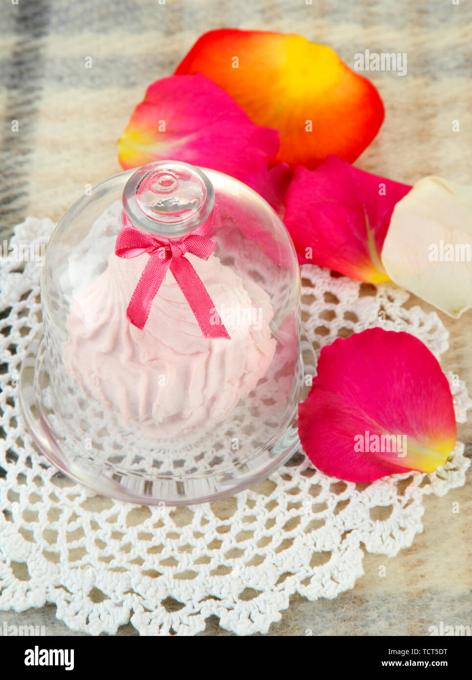 Marshmallows on saucer with transparent cover on light background Stock ...