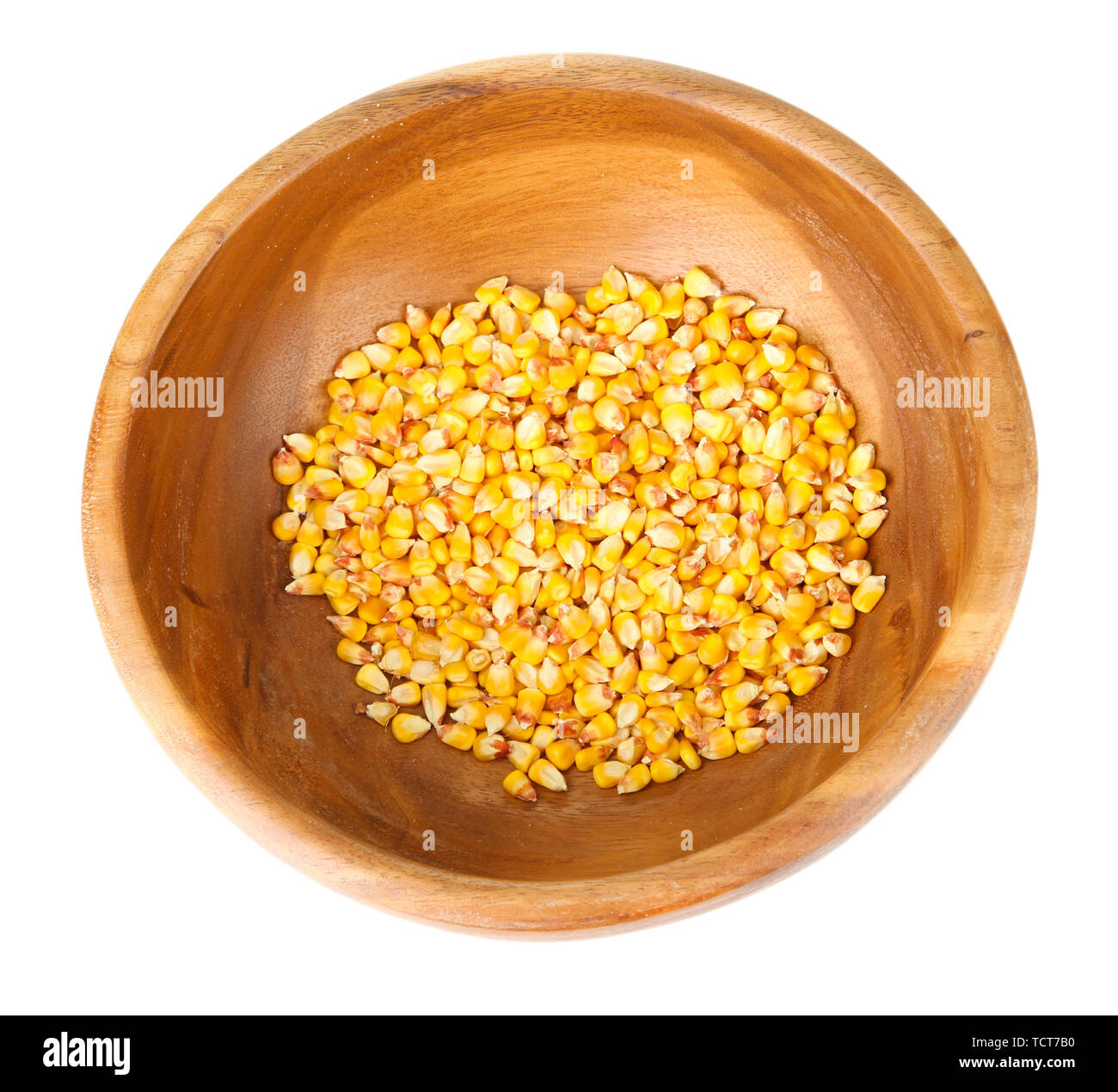 Corn in wooden bowl isolated on white Stock Photo - Alamy