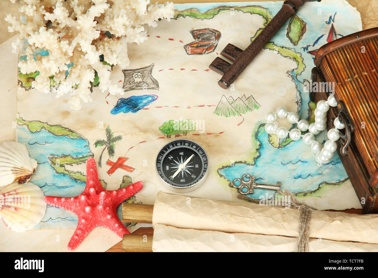 map of treasures on wooden background Stock Photo - Alamy
