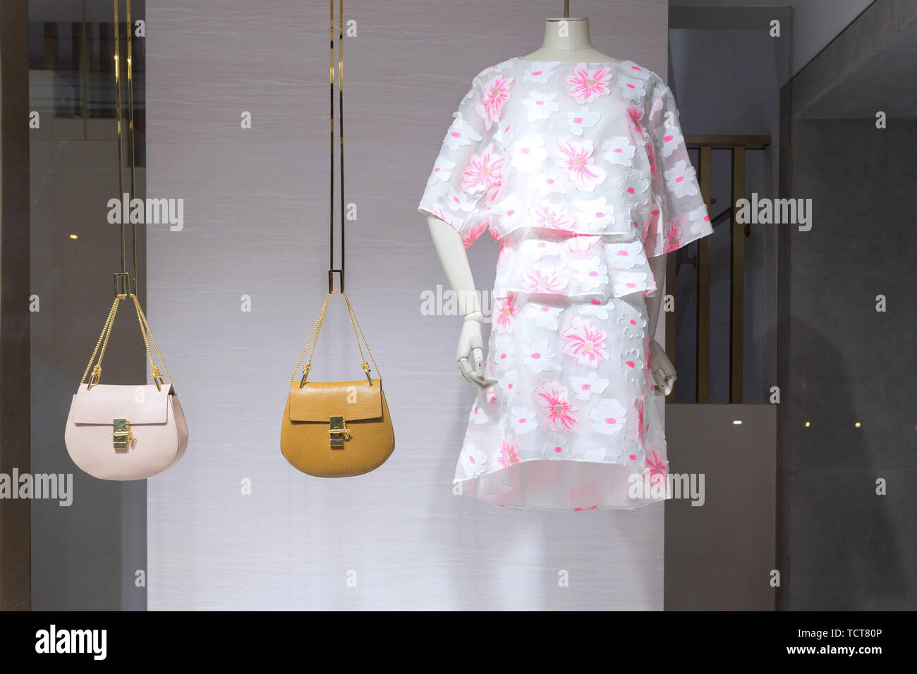 mannequin in fashion shop display window Stock Photo - Alamy