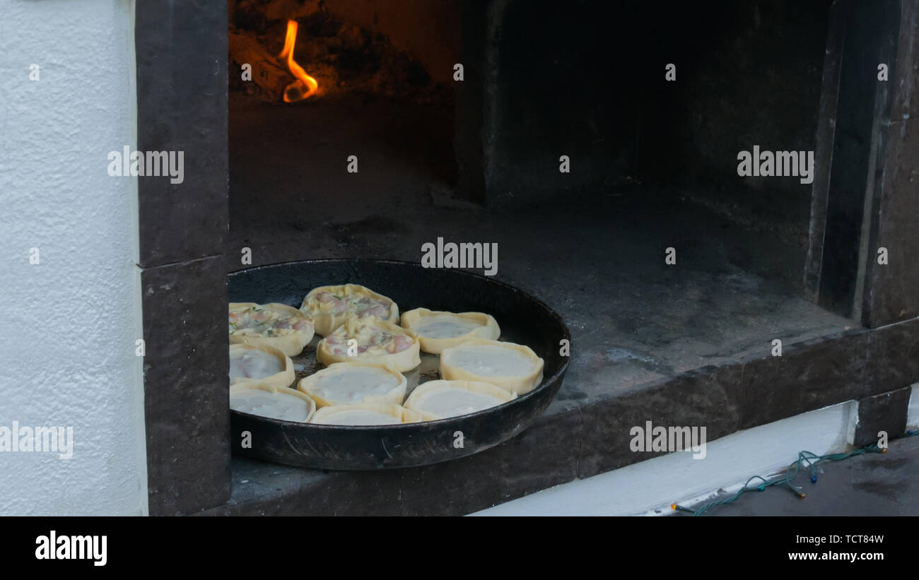 Process of cooking hot pies with chicken and cheese Stock Photo - Alamy