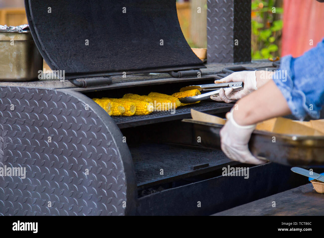 Chef cooking healthy yellow corn Stock Photo - Alamy