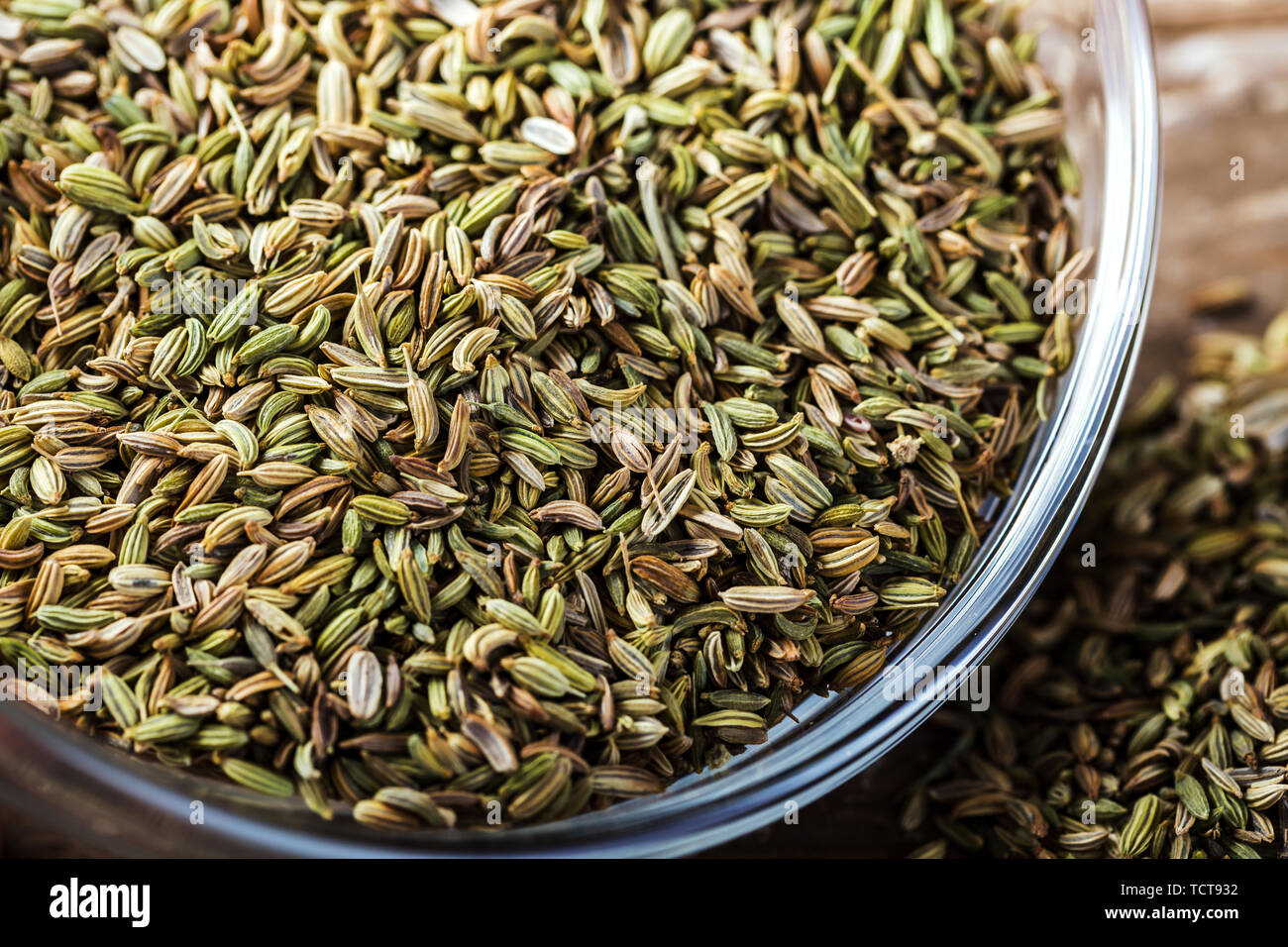 Fennel seeds in a glass bowl, close-up Stock Photo - Alamy