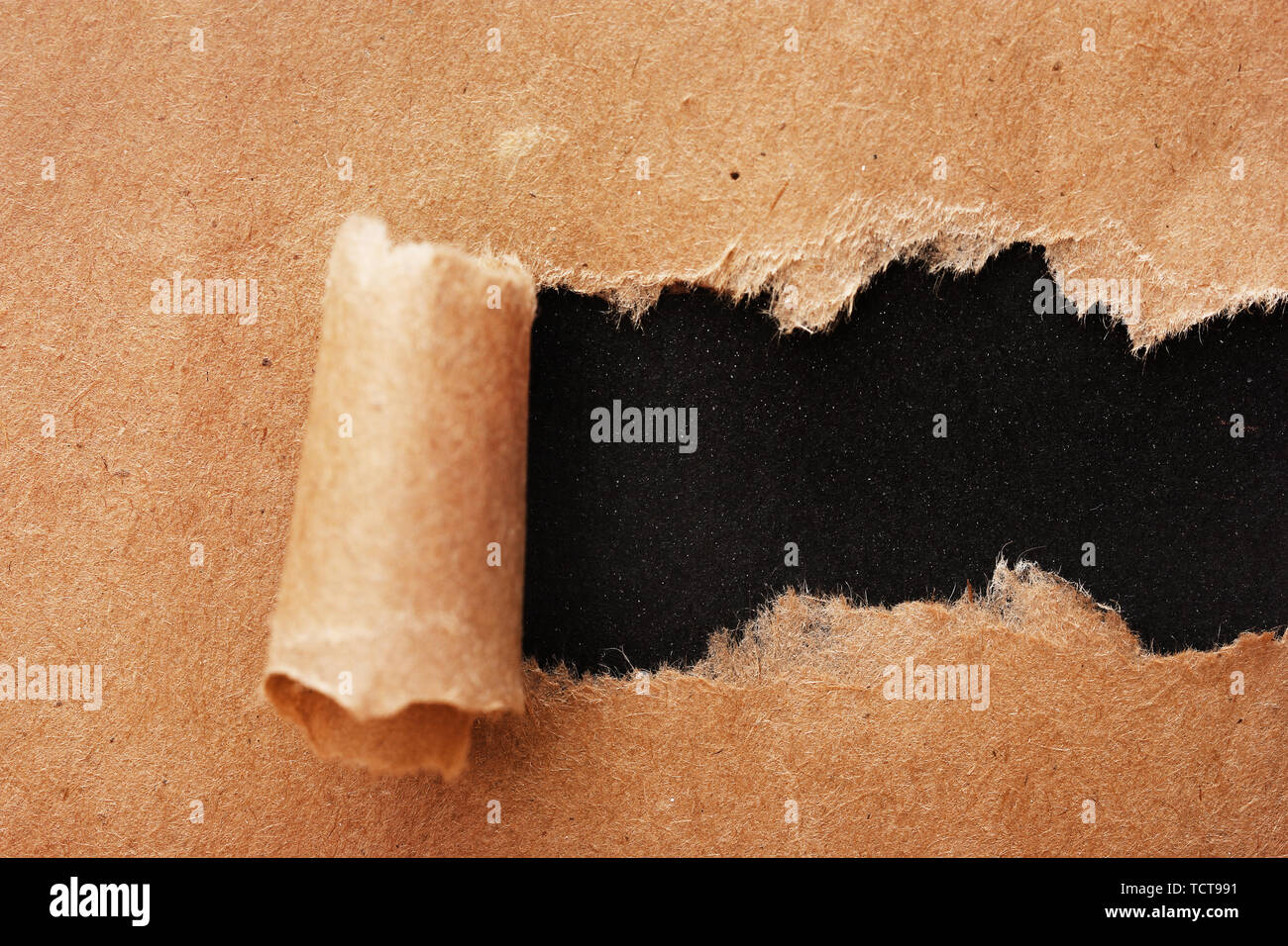 Torn kraft paper background Stock Photo - Alamy