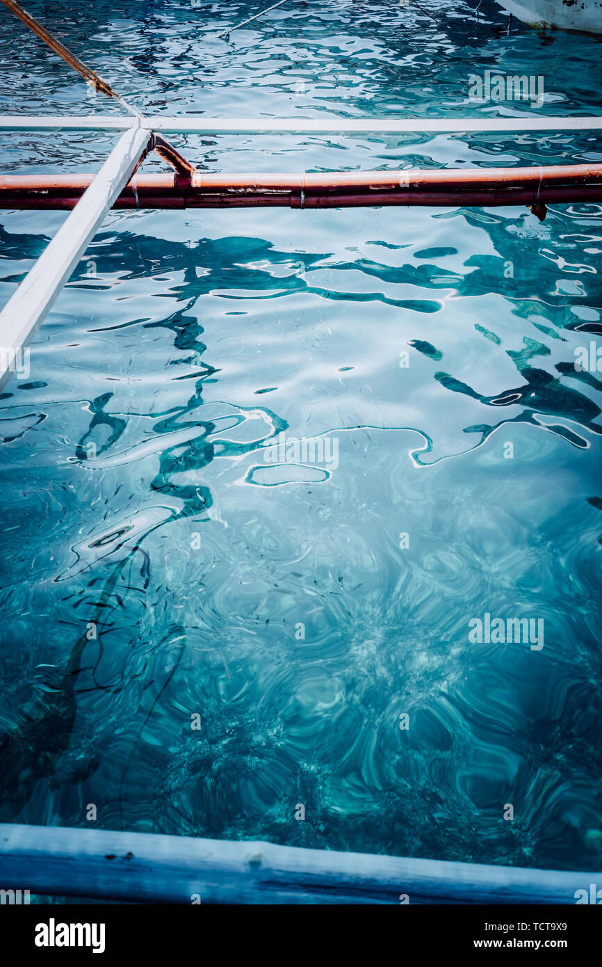 Blue rippled sea water surface near Banca boat. El Nido, Palawan ...