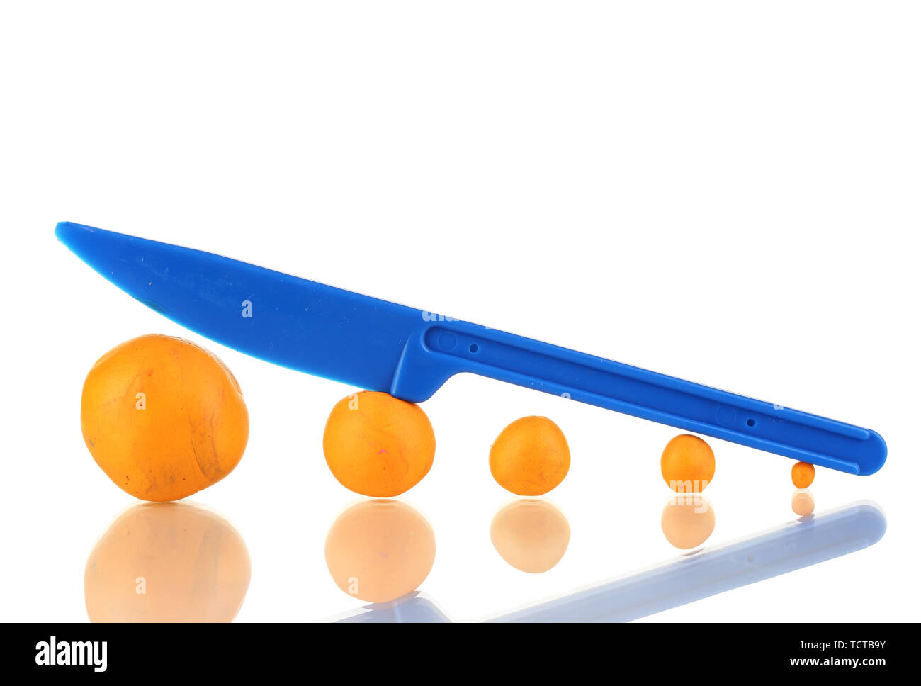 Balls of plasticine isolated on white Stock Photo - Alamy