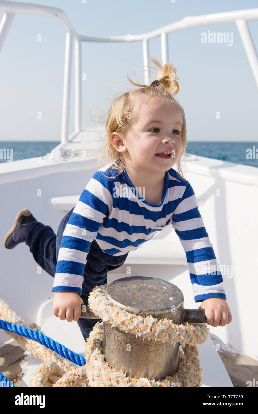 Baby enjoy sea cruise. Boy sailor travel sea. Boy sea yacht travel ...