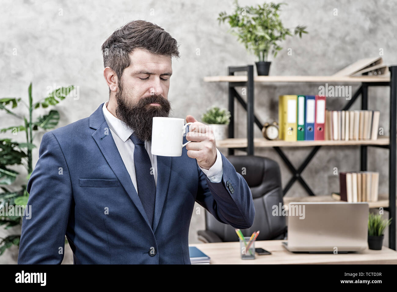 Drinking coffee relaxing break. Boss enjoying energy drink. Start day ...