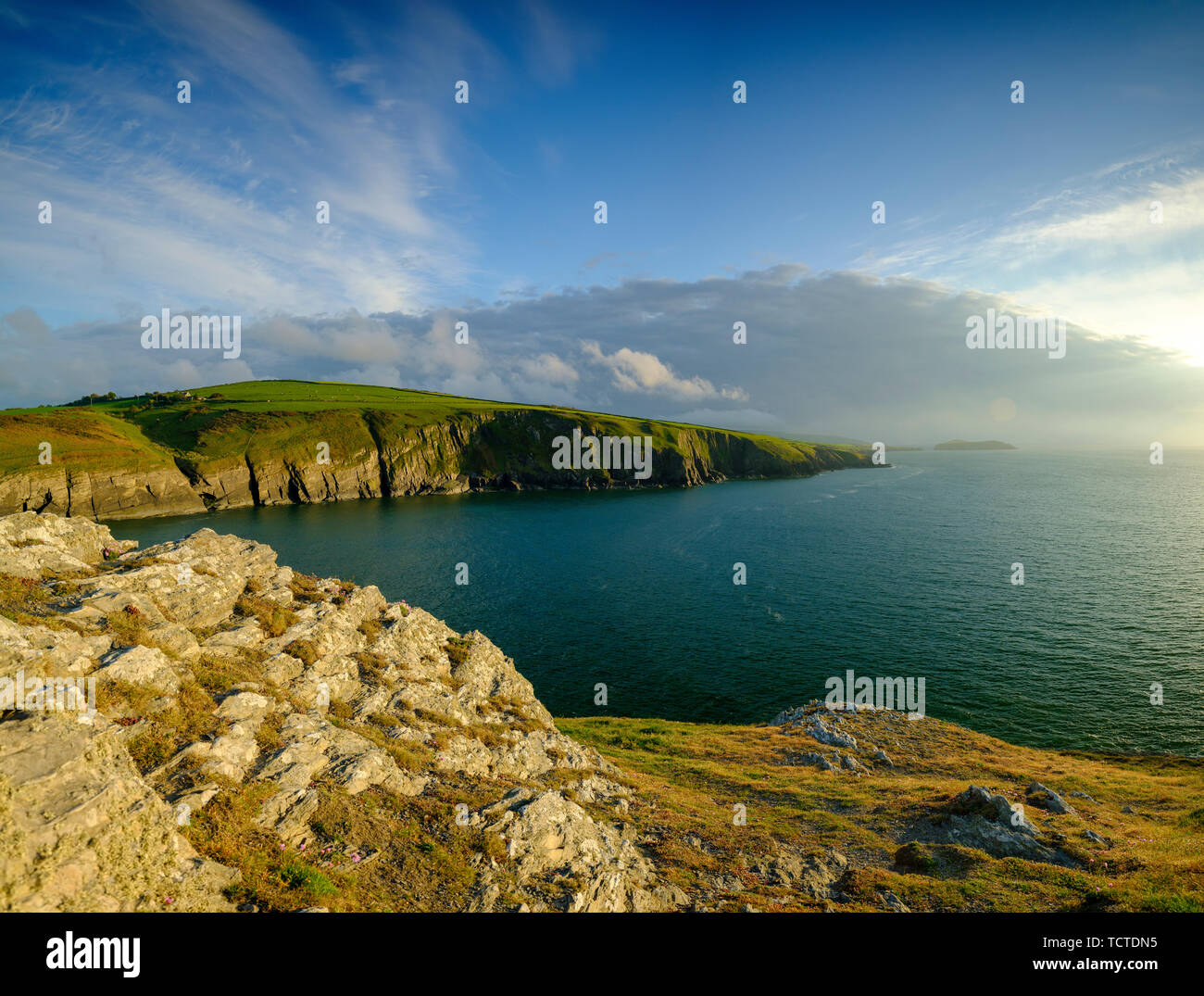Mwnt, Wales - May 23, 2019: Evening light on the Ceredigion coast and ...