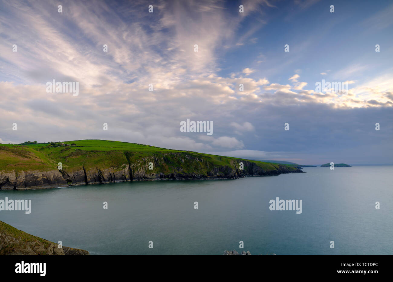 Mwnt, Wales - May 23, 2019: Evening light on the Ceredigion coast and ...