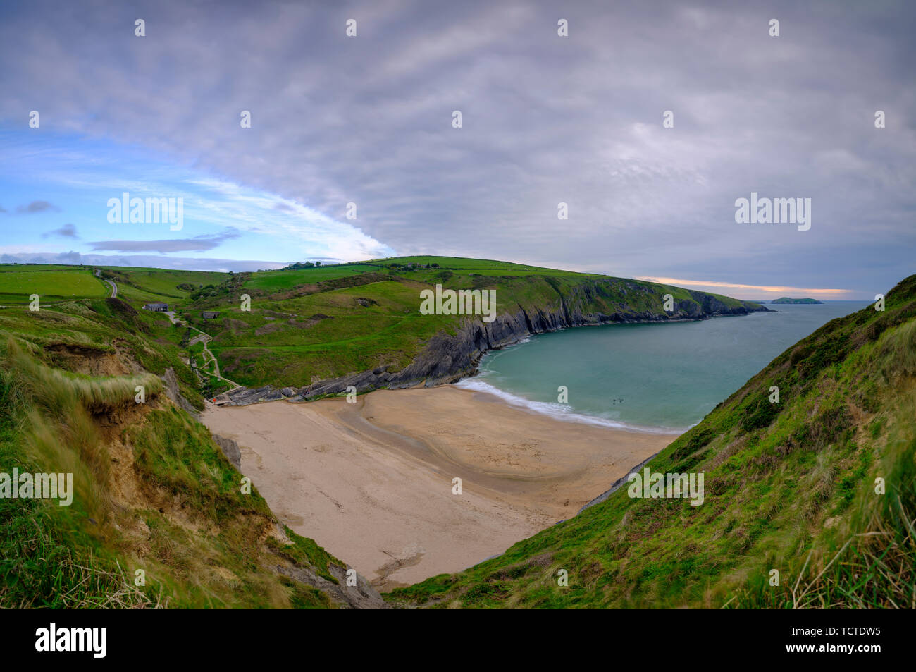 Mwnt, Wales - May 23, 2019: Evening light on the Ceredigion coast and ...