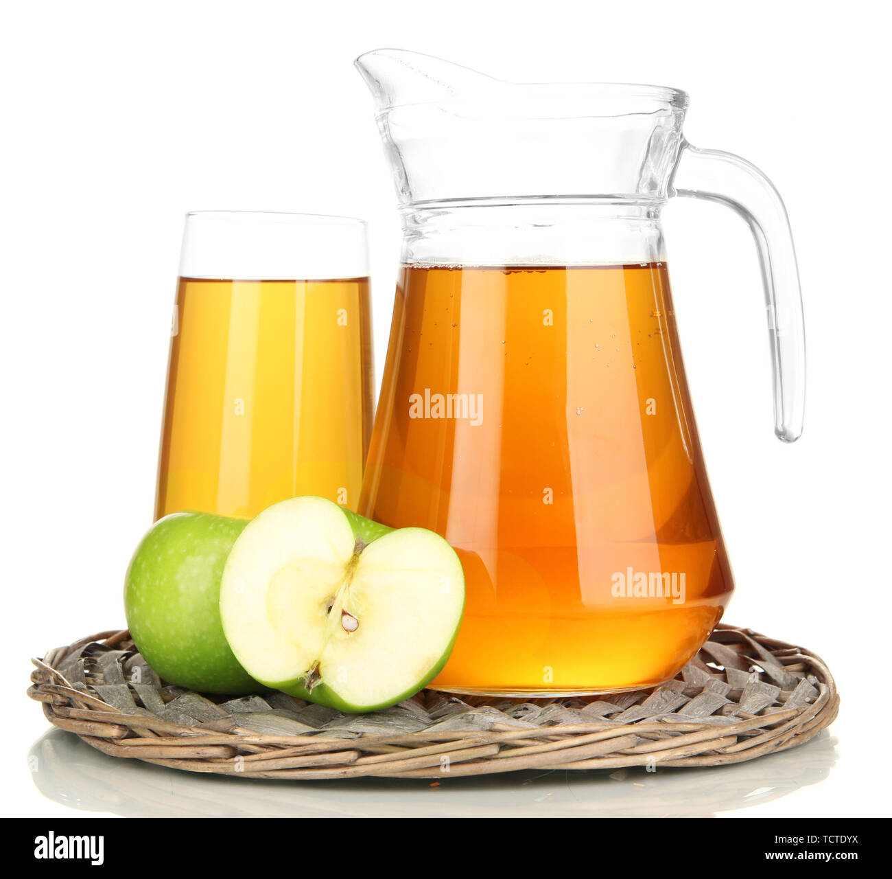 Full glass and jug of apple juice and apples isolted on white Stock ...