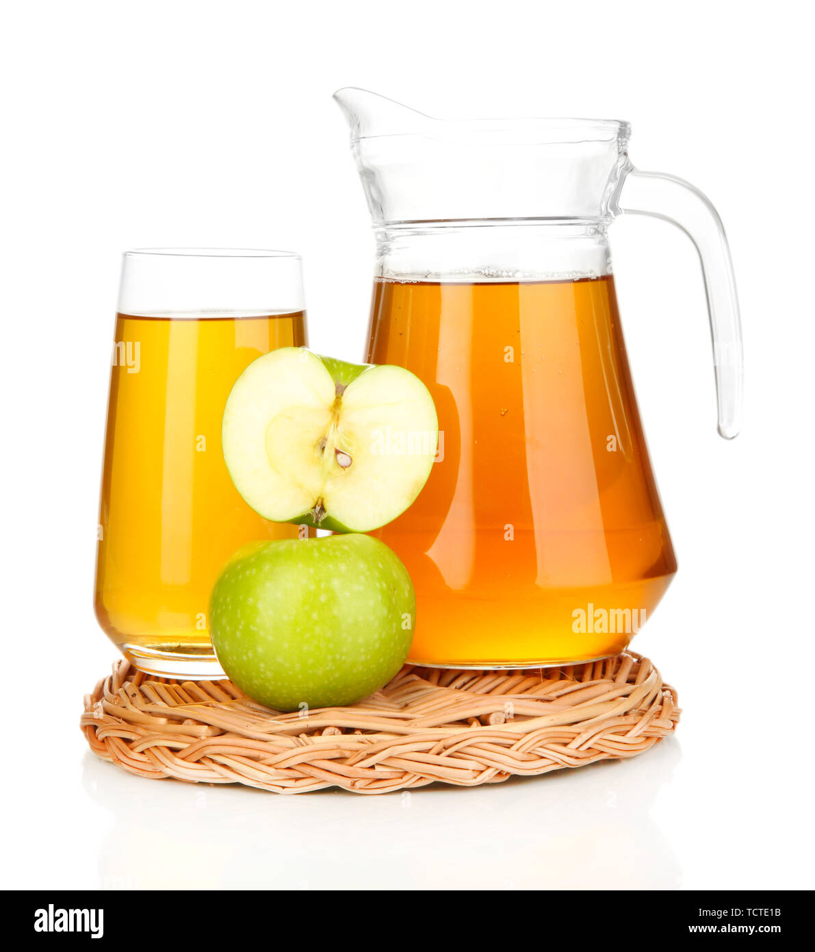 Full glass and jug of apple juice and apples isolted on white Stock ...