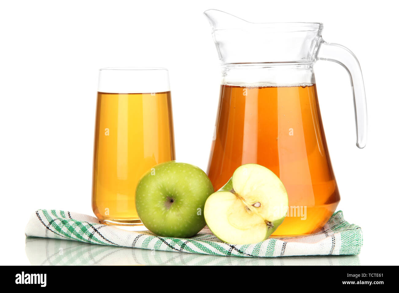 Full glass and jug of apple juice and apples isolted on white Stock ...