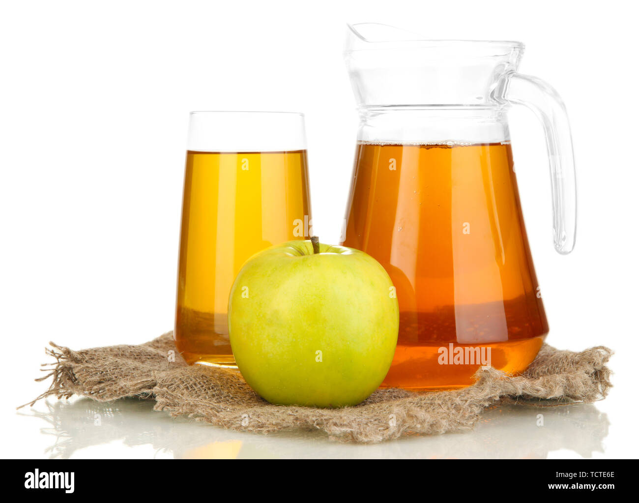 Full glass and jug of apple juice and apple isolted on white Stock ...