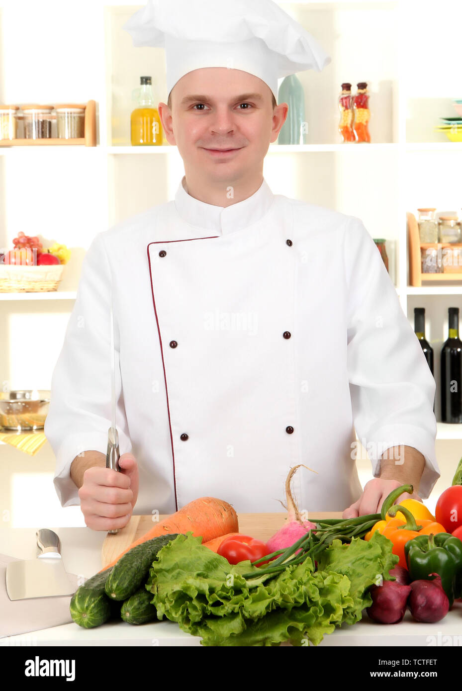 Chef cooking in kitchen Stock Photo - Alamy
