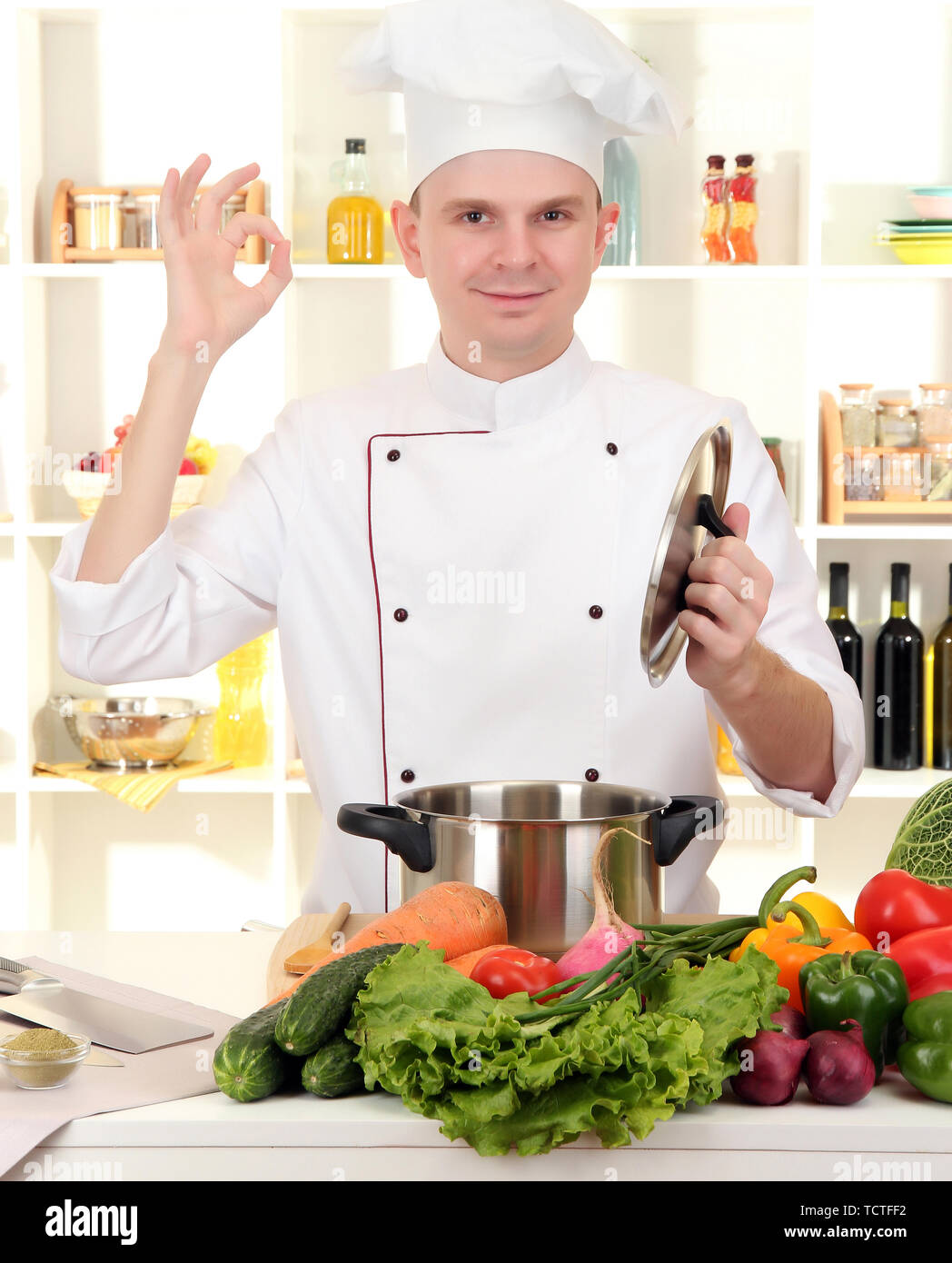 Chef cooking in kitchen Stock Photo - Alamy