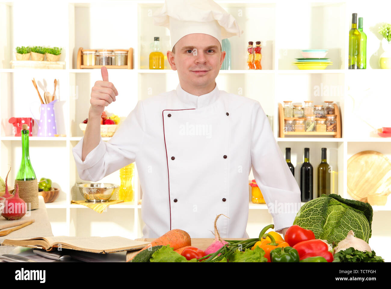 Chef cooking in kitchen Stock Photo - Alamy
