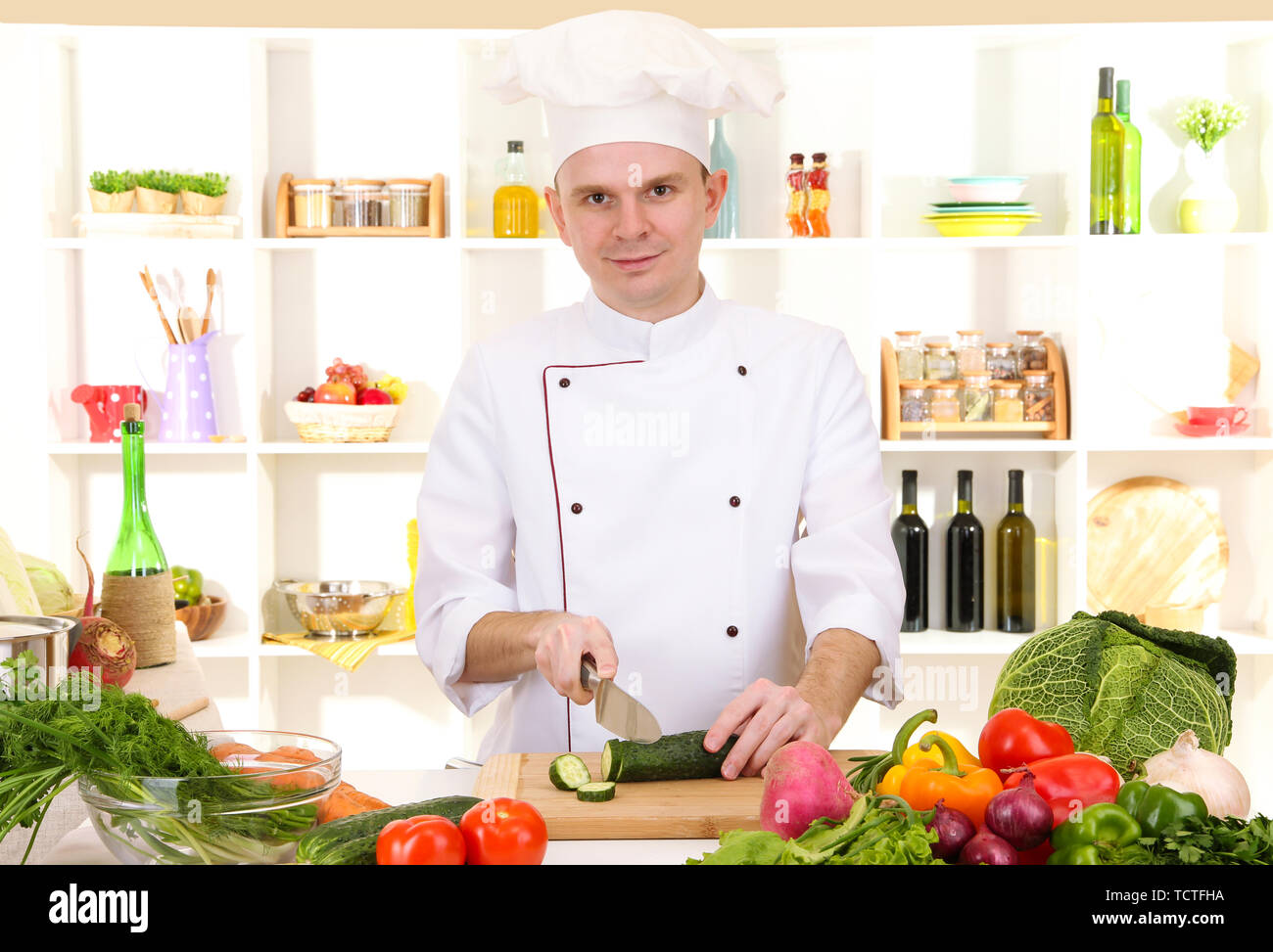 Chef cooking in kitchen Stock Photo - Alamy