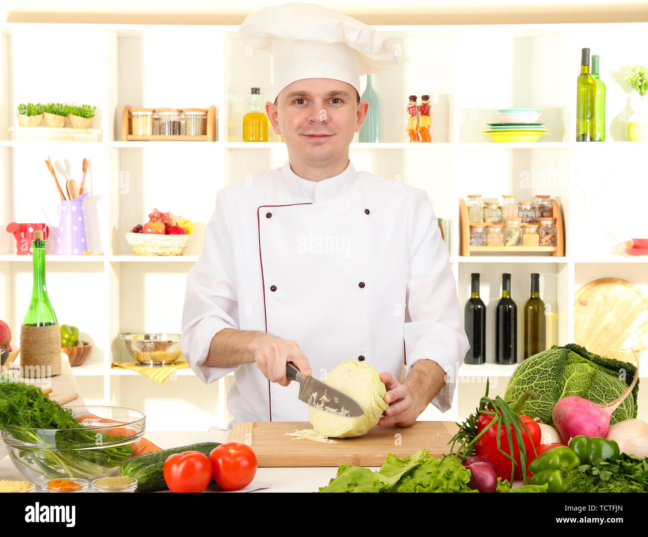 Chef cooking in kitchen Stock Photo - Alamy