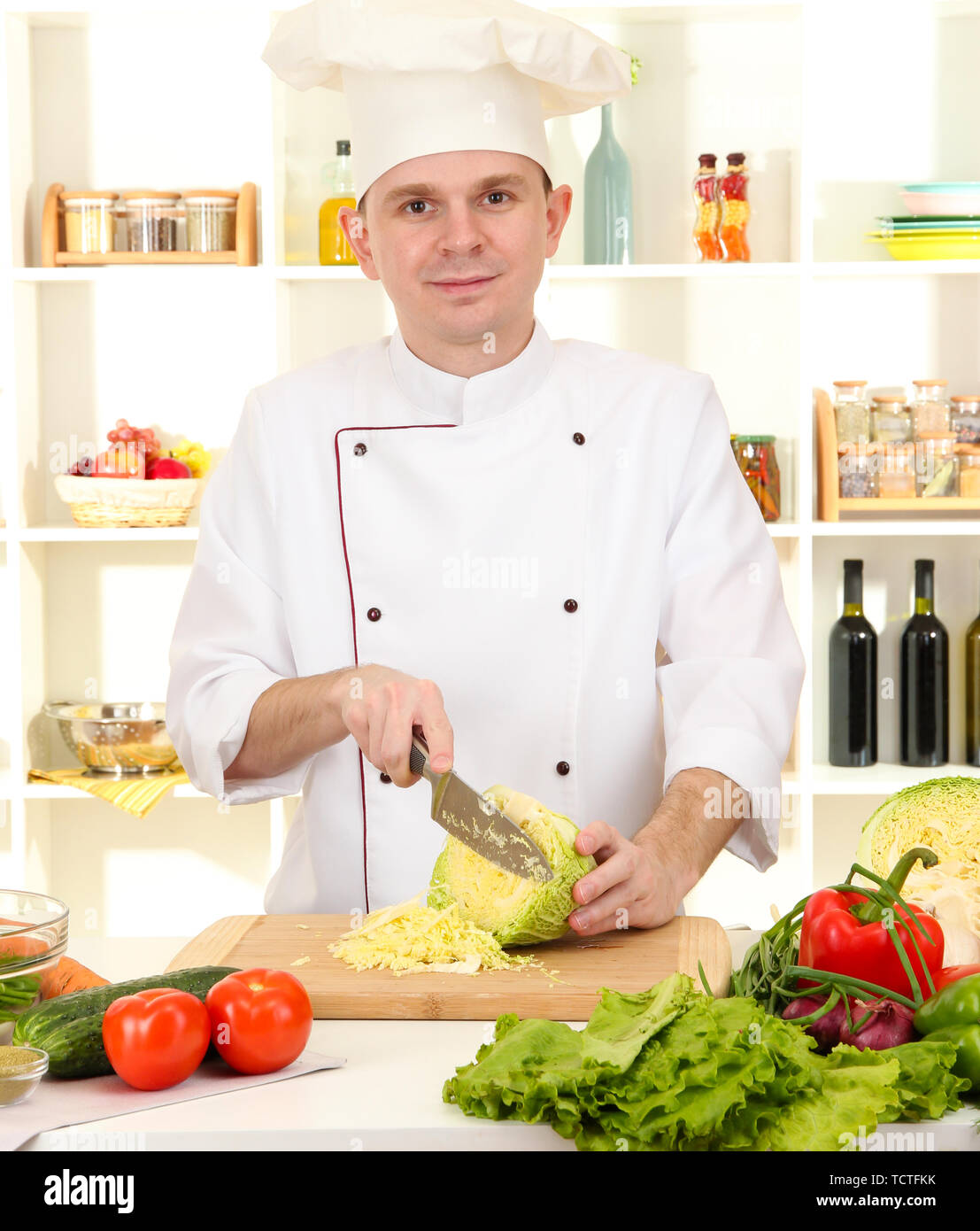Chef cooking in kitchen Stock Photo - Alamy