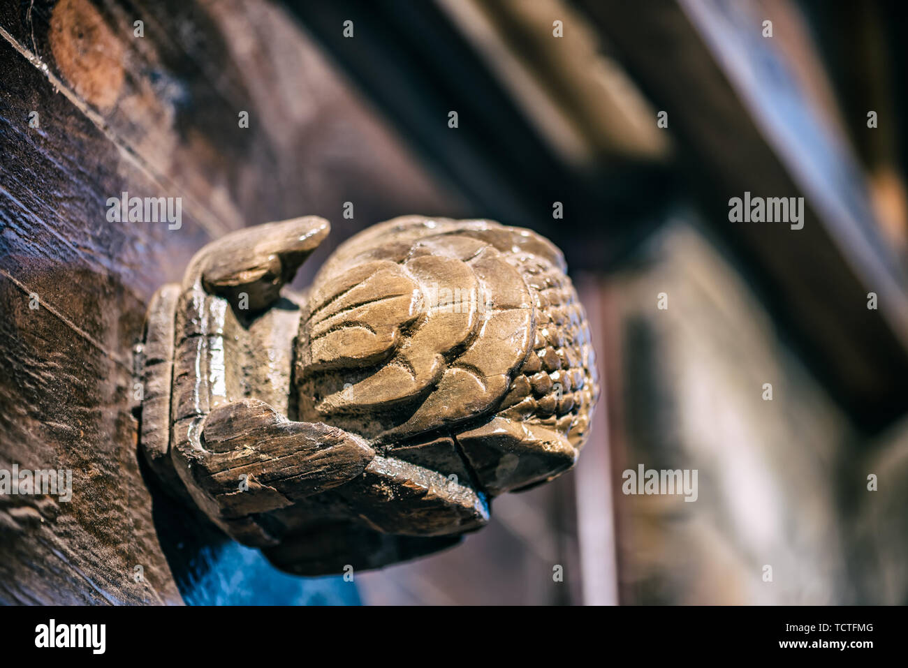 Closeup of wooden pillar head carving of traditional Chinese ...