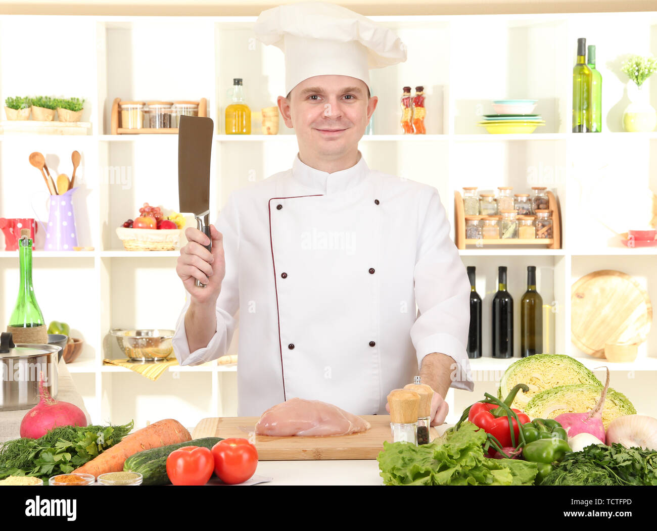 Chef cooking in kitchen Stock Photo - Alamy