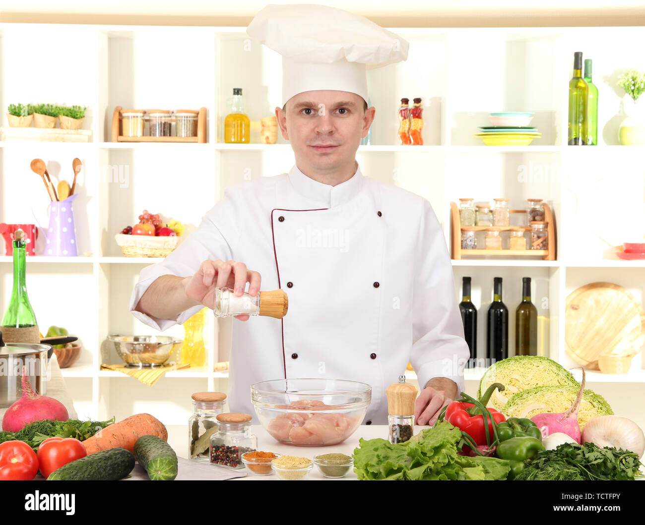 Chef cooking in kitchen Stock Photo - Alamy