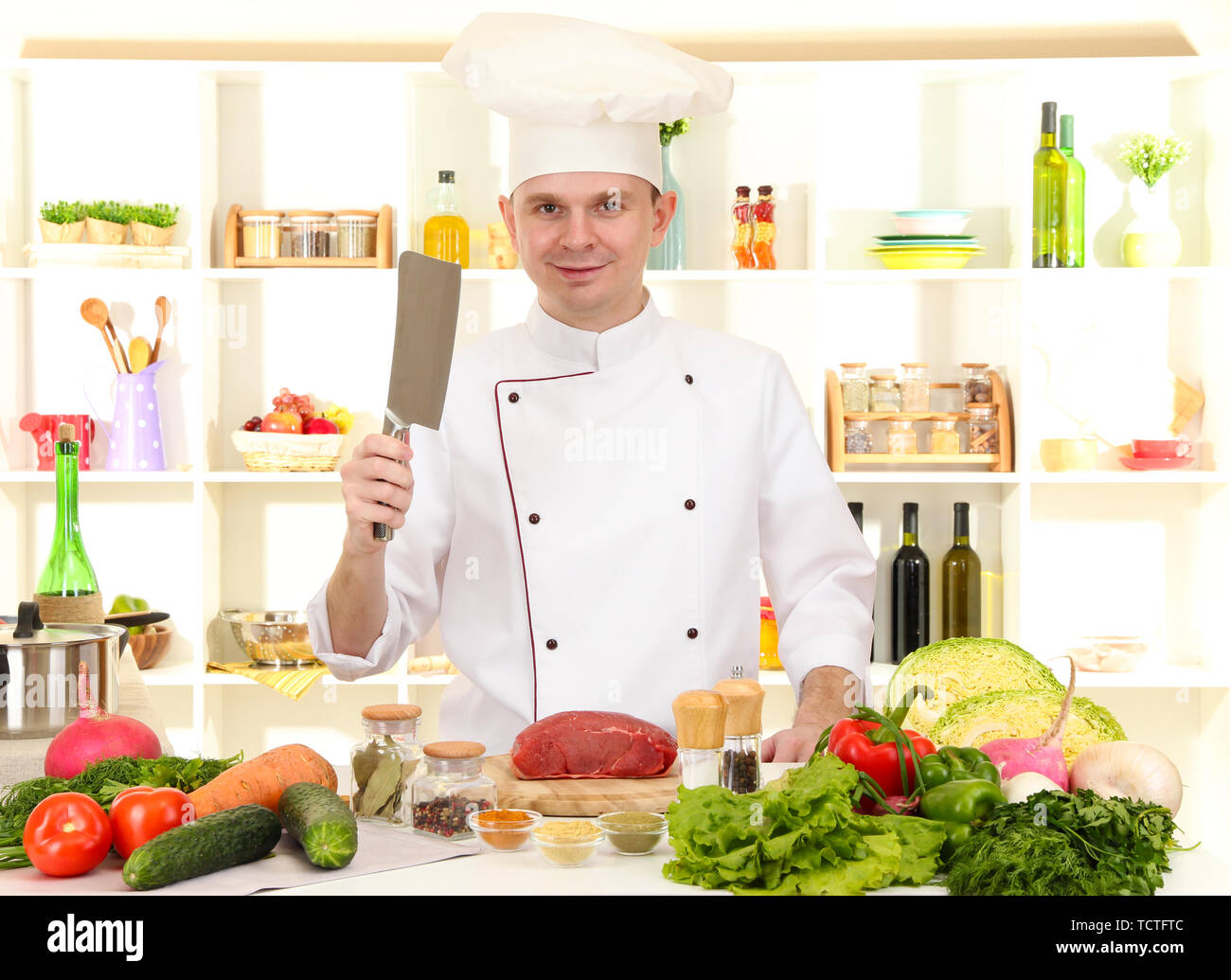 Chef cooking in kitchen Stock Photo - Alamy
