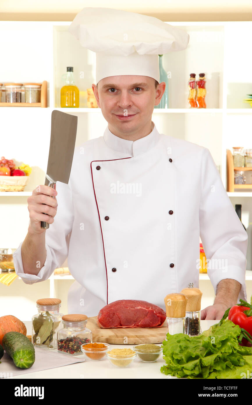 Chef cooking in kitchen Stock Photo - Alamy