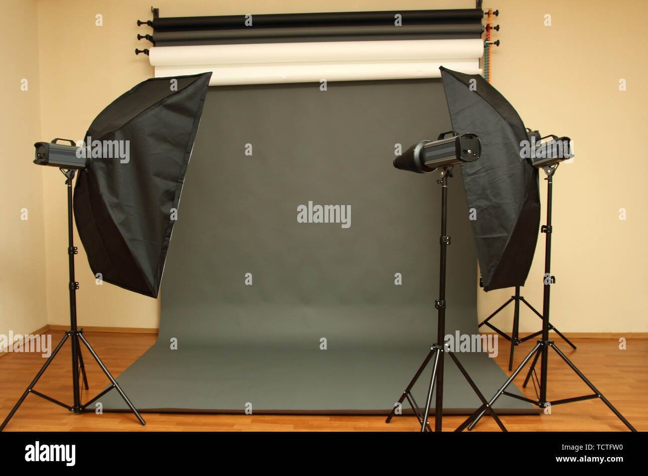 Empty photo studio with lighting equipment Stock Photo - Alamy