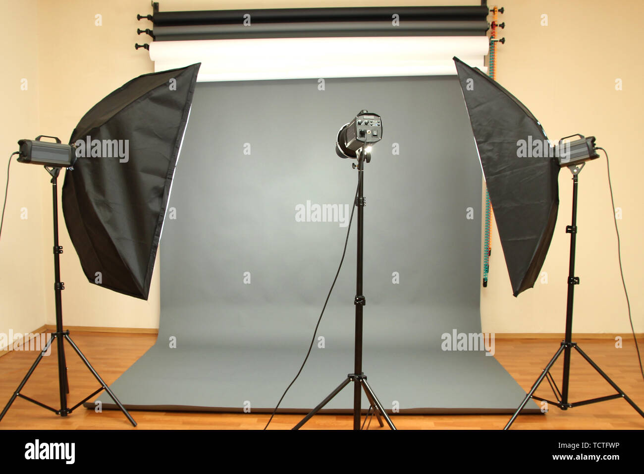 Empty photo studio with lighting equipment Stock Photo - Alamy