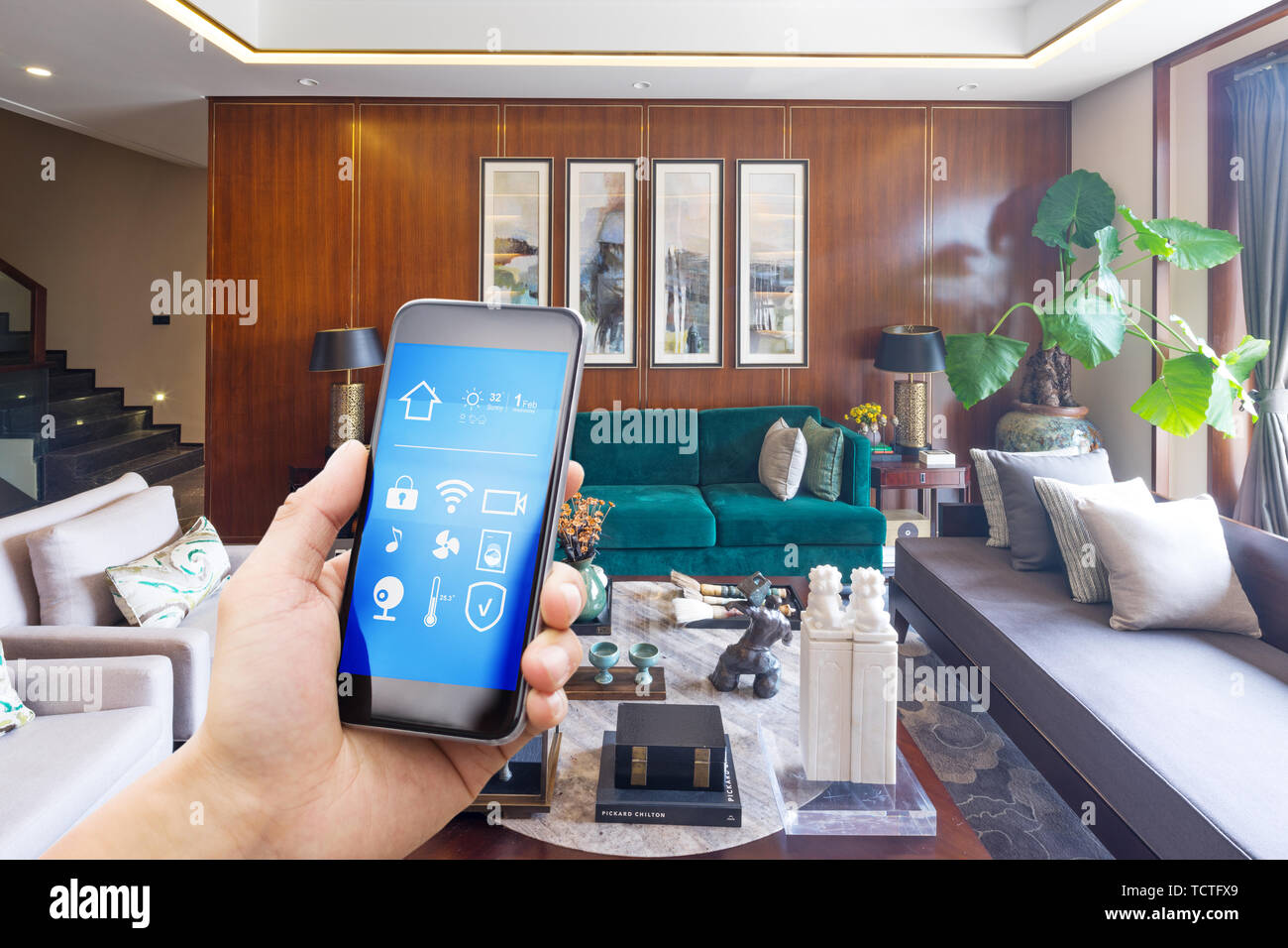 smart phone with smart home with modern living room Stock Photo - Alamy