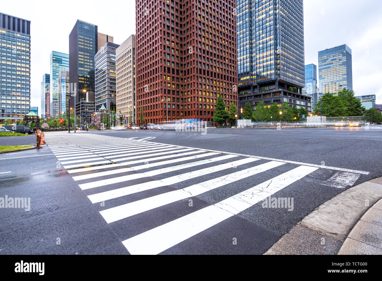 traffic on road intersection in downtown of tokyo Stock Photo - Alamy