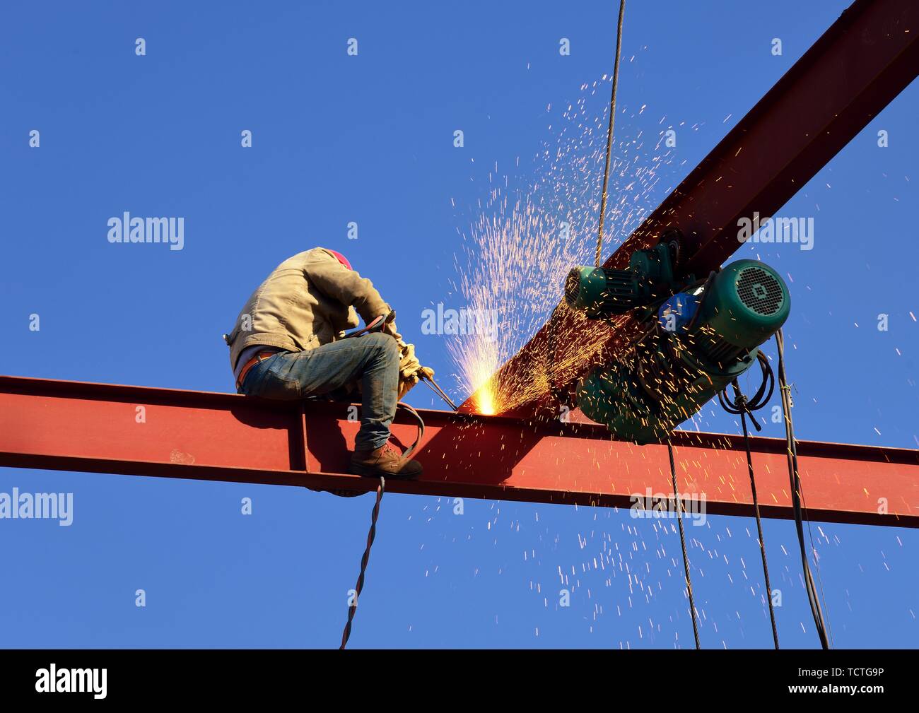 High-altitude electric welding operation Stock Photo - Alamy