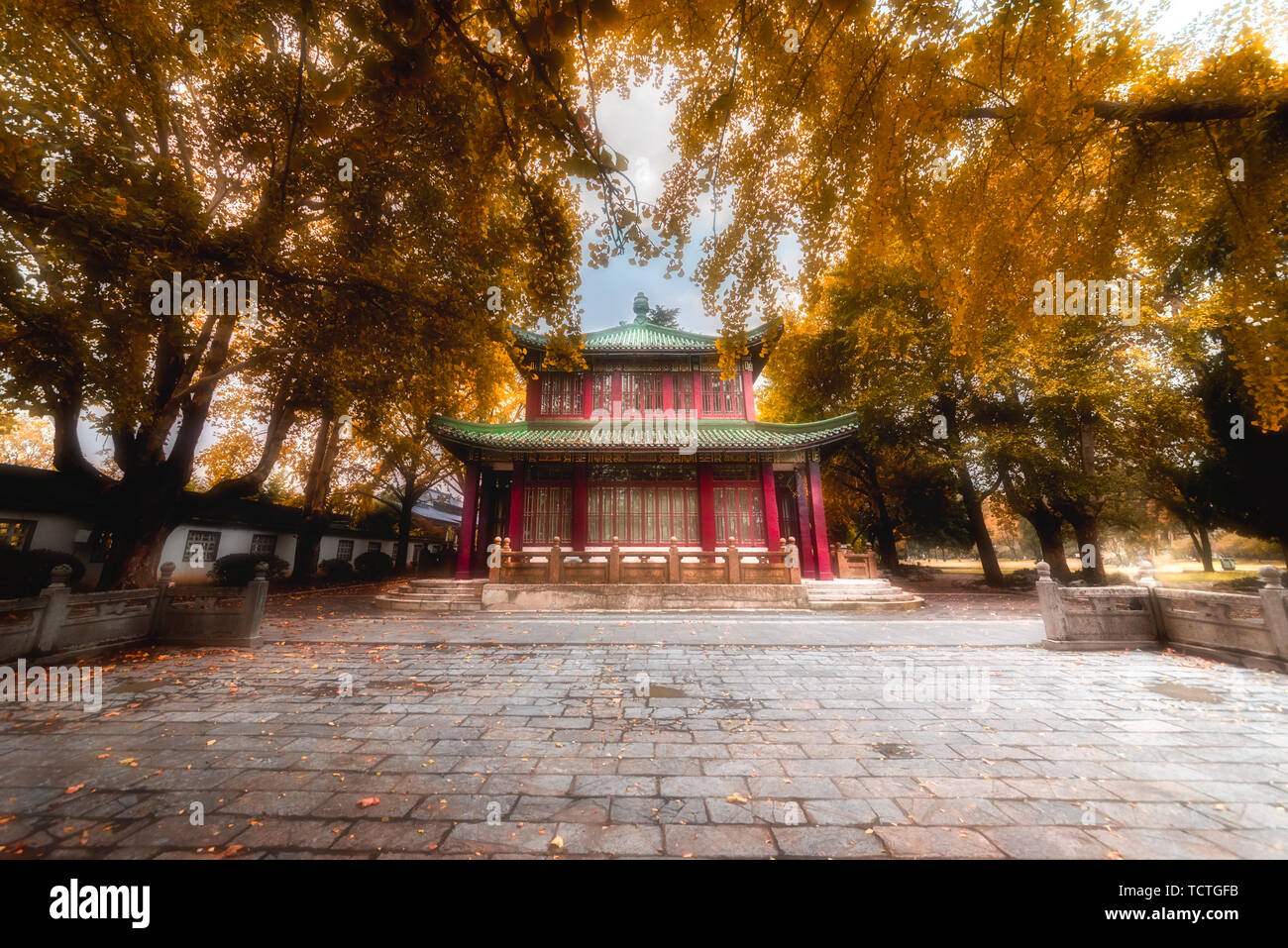 Ancient buildings under fallen leaves in autumn Stock Photo - Alamy