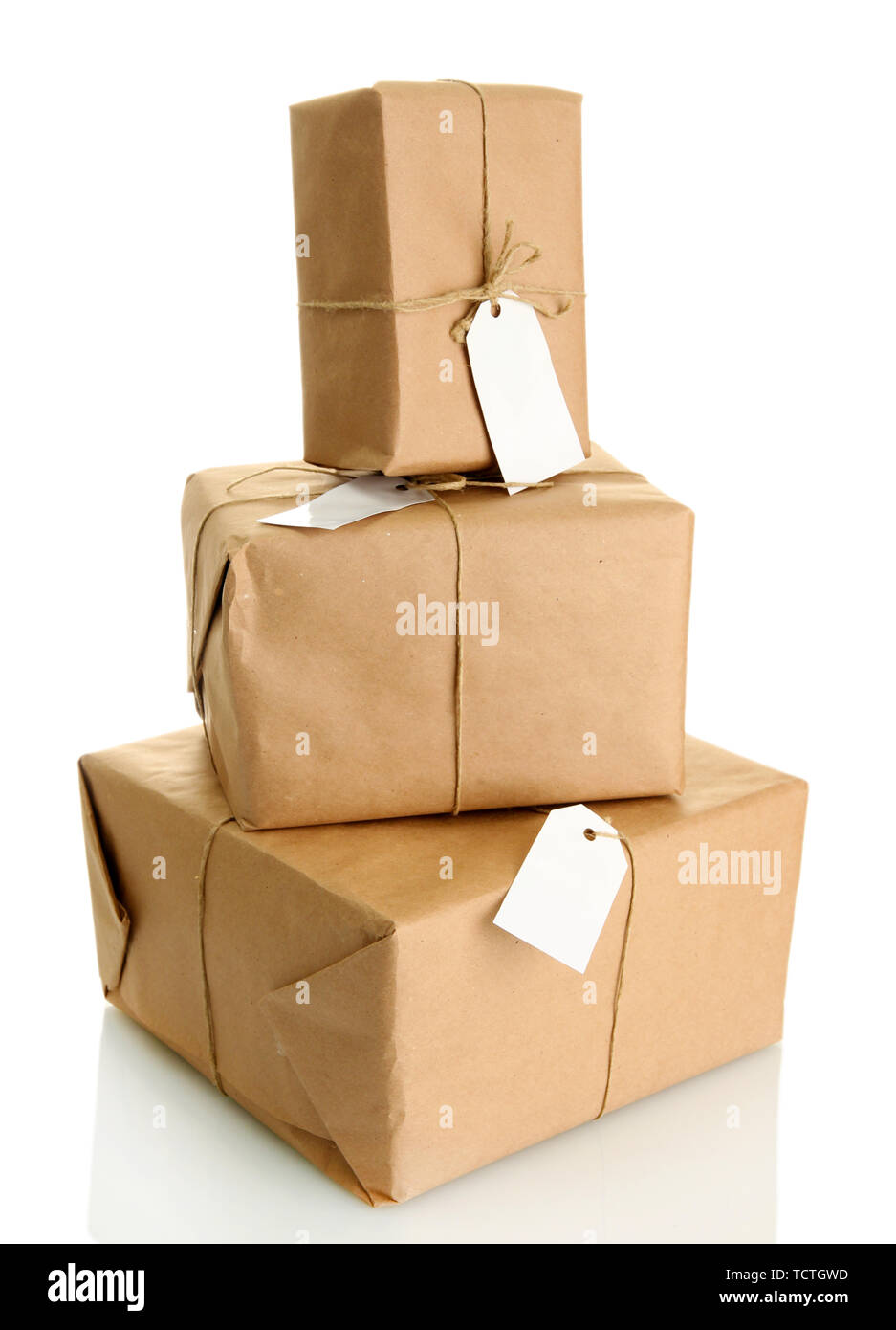 parcels boxes with kraft paper, isolated on white Stock Photo - Alamy